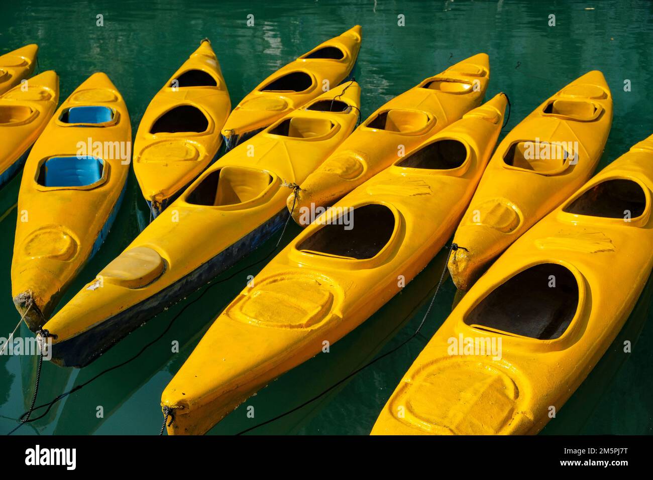 Yellow kayaks in Lan Ha Bay in Cat Ba, Vietnam Stock Photo - Alamy