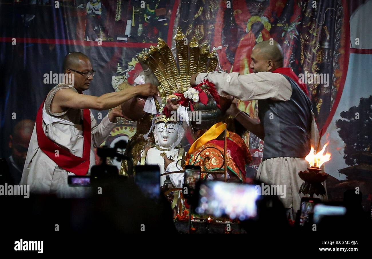 Kathmandu, Bagmati, Nepal. 30th Dec, 2022. Priests bath an idol of Seto ...