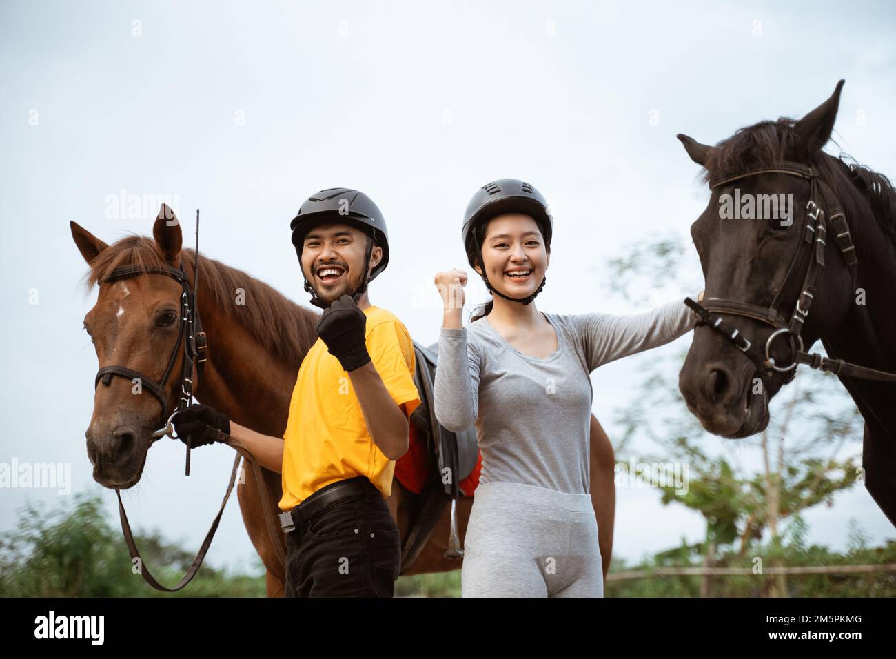 two equestrian athletes ride horses and start training Stock Photo - Alamy