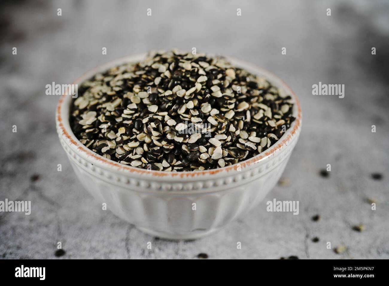 Black Lentils pulses | Urad daal served in a bowl, selective focus ...