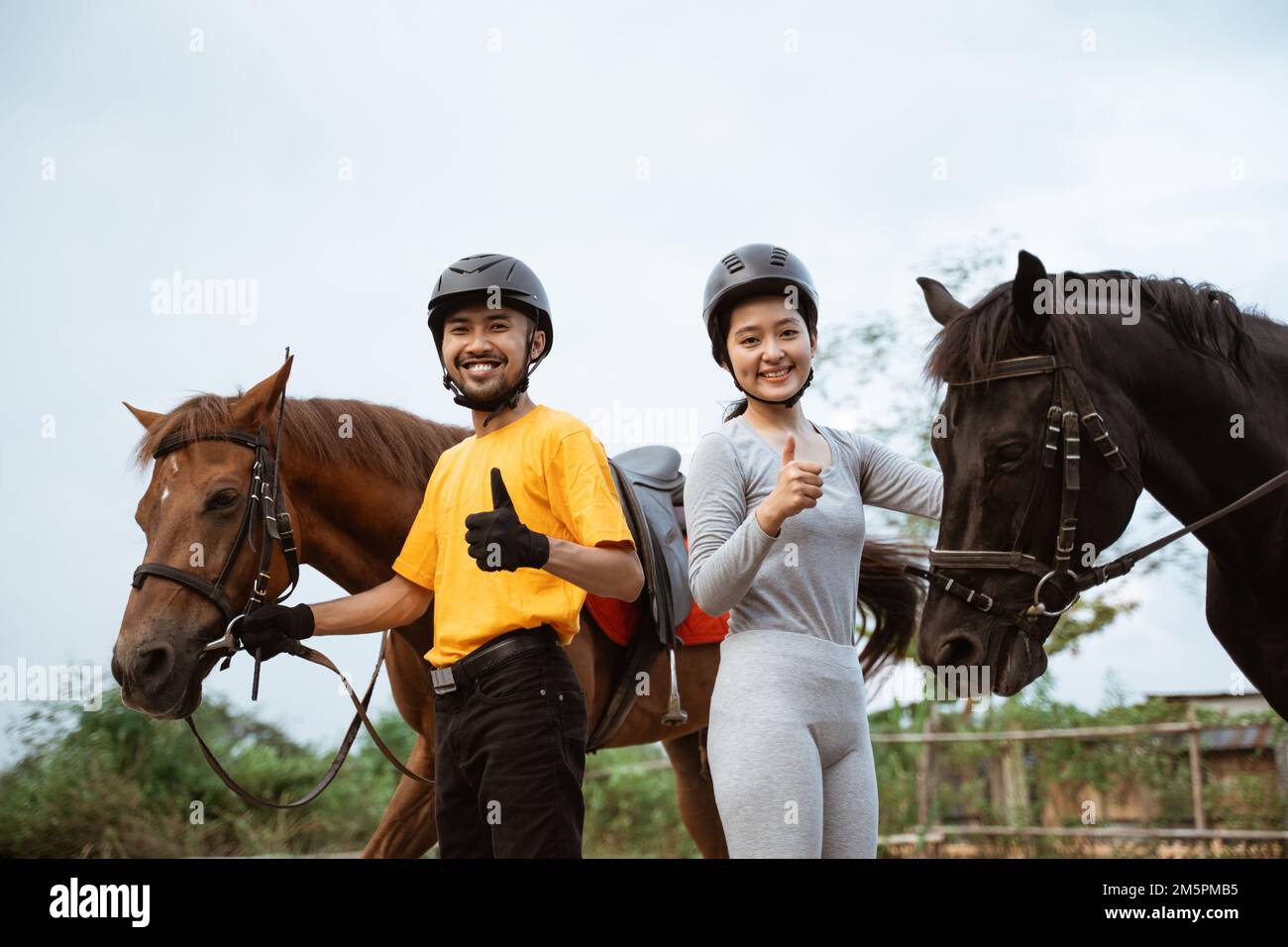 two equestrian athletes ride horses and start training Stock Photo - Alamy