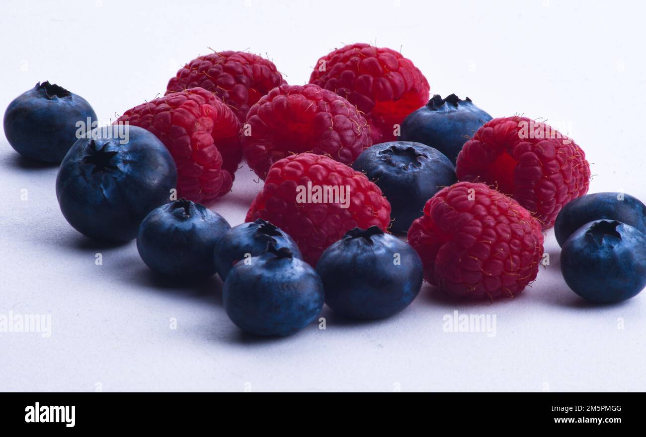 Raspberries one blackberry on hi-res stock photography and images - Alamy