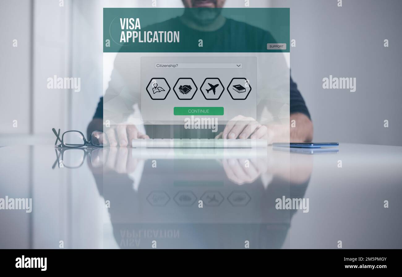 Man filling visa application form on laptop. Work recruitment, study ...