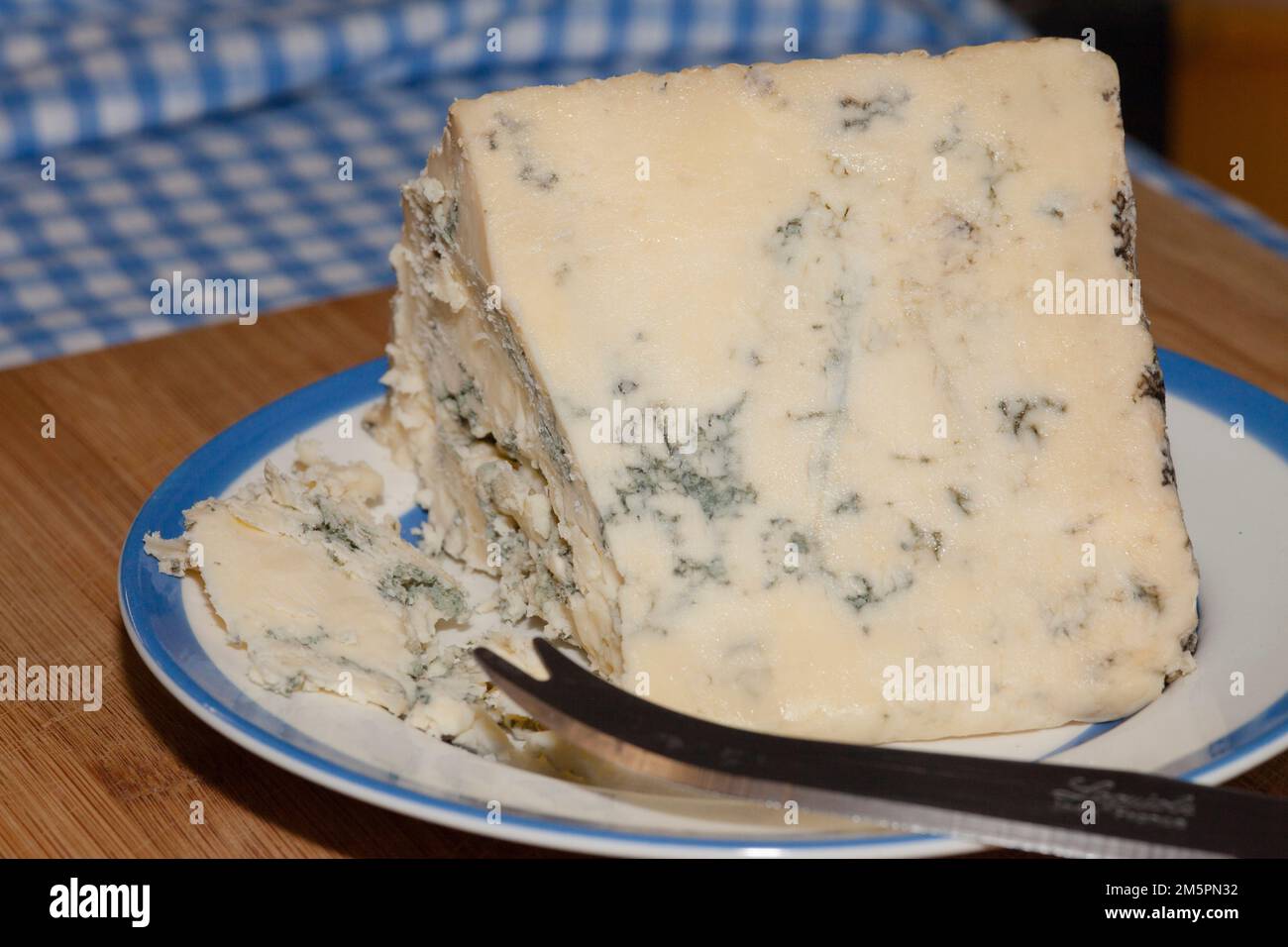 Blue stilton English cheese on Cornish ware blue and white plate Stock ...