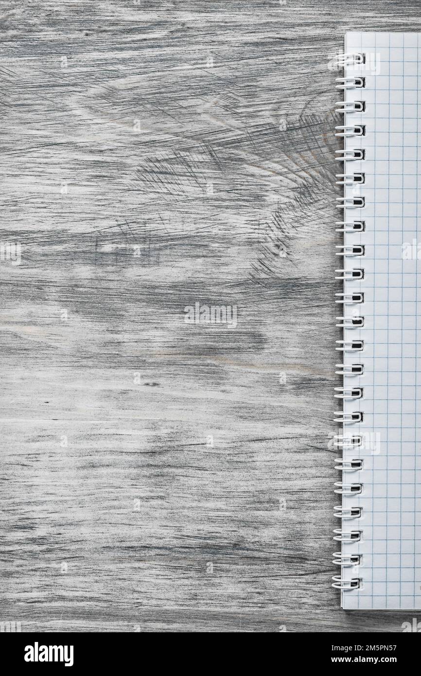 Checked note-book on wooden board copy space office concept Stock Photo ...