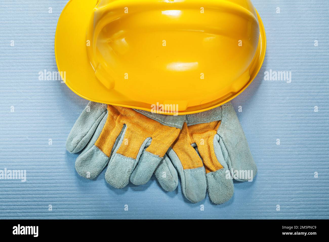 Construction building helmet safety gloves Stock Photo - Alamy