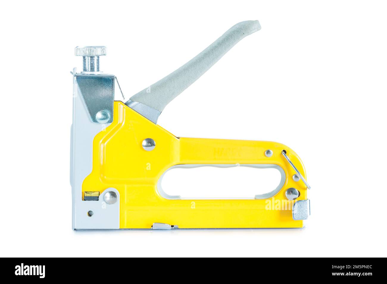 Construction stapler gun isolated on white Stock Photo - Alamy