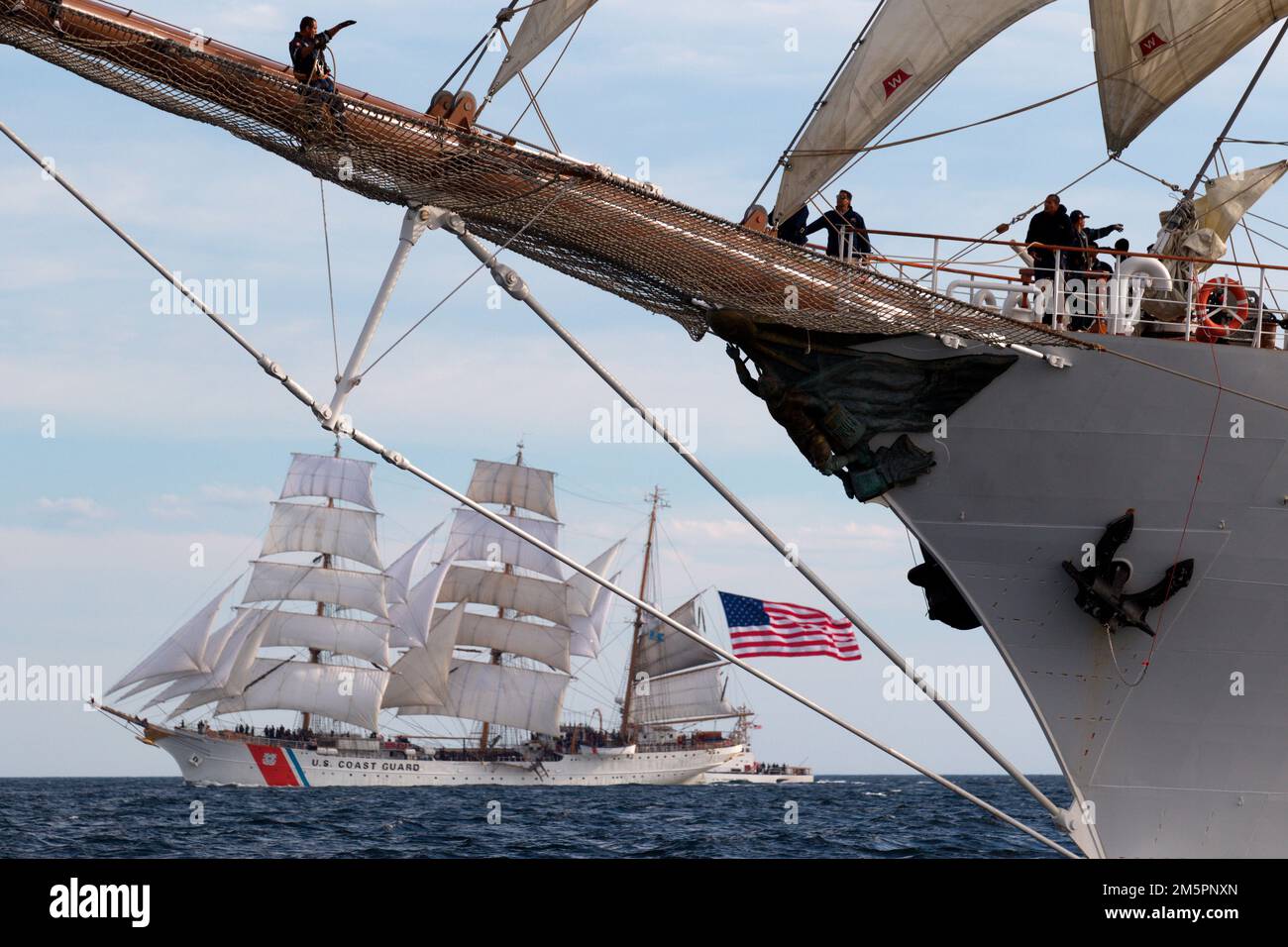 USCG Eagle from under the bowsprit of Peruvian tall ship BAP Union ...