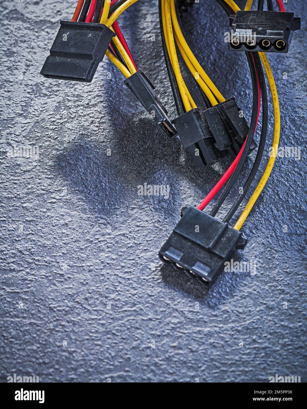 Electric cords with connectors on black background top view electricity ...