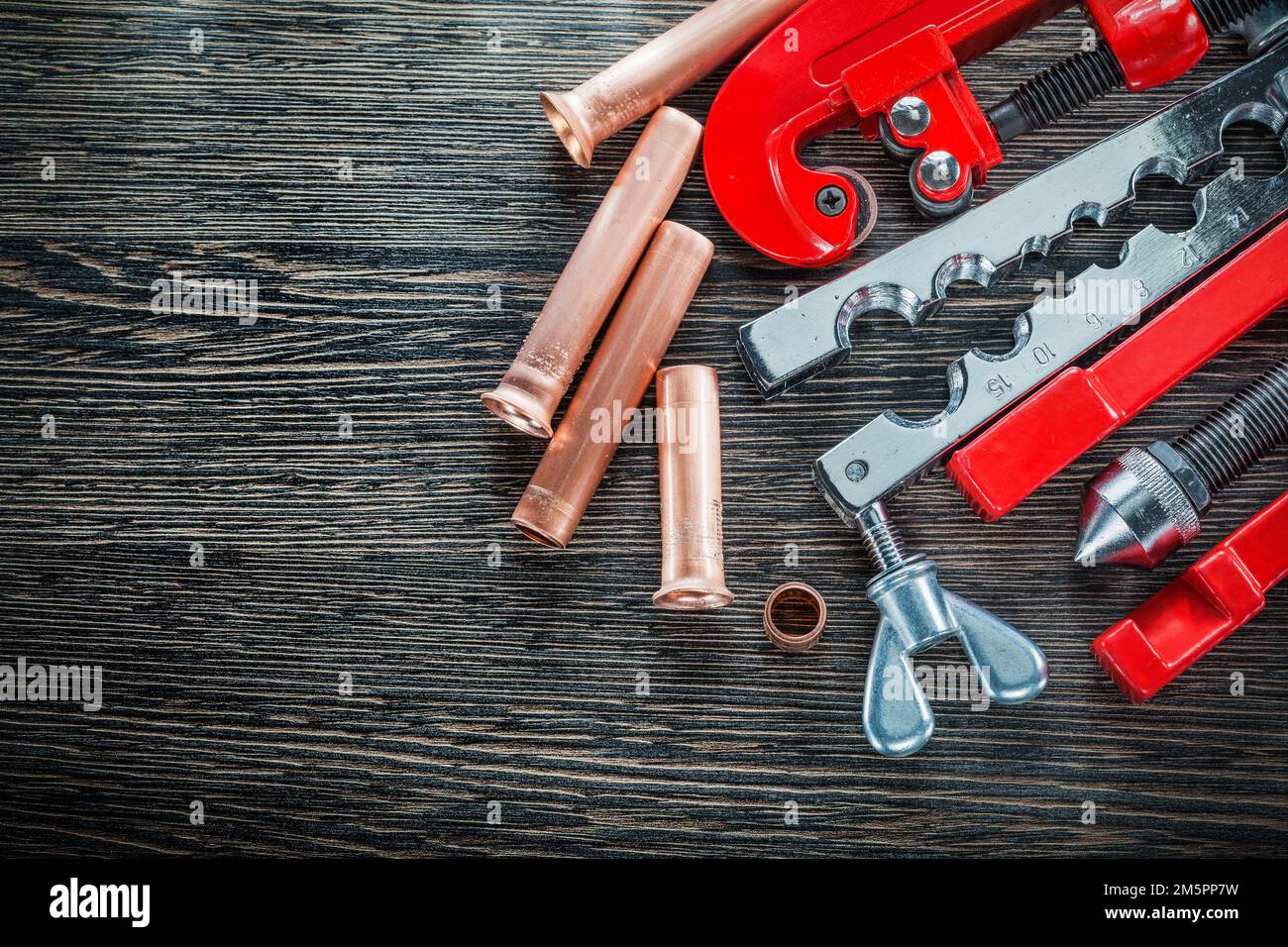 Flaring clamp tube cutter brake plumper copper flared pipes on wooden ...