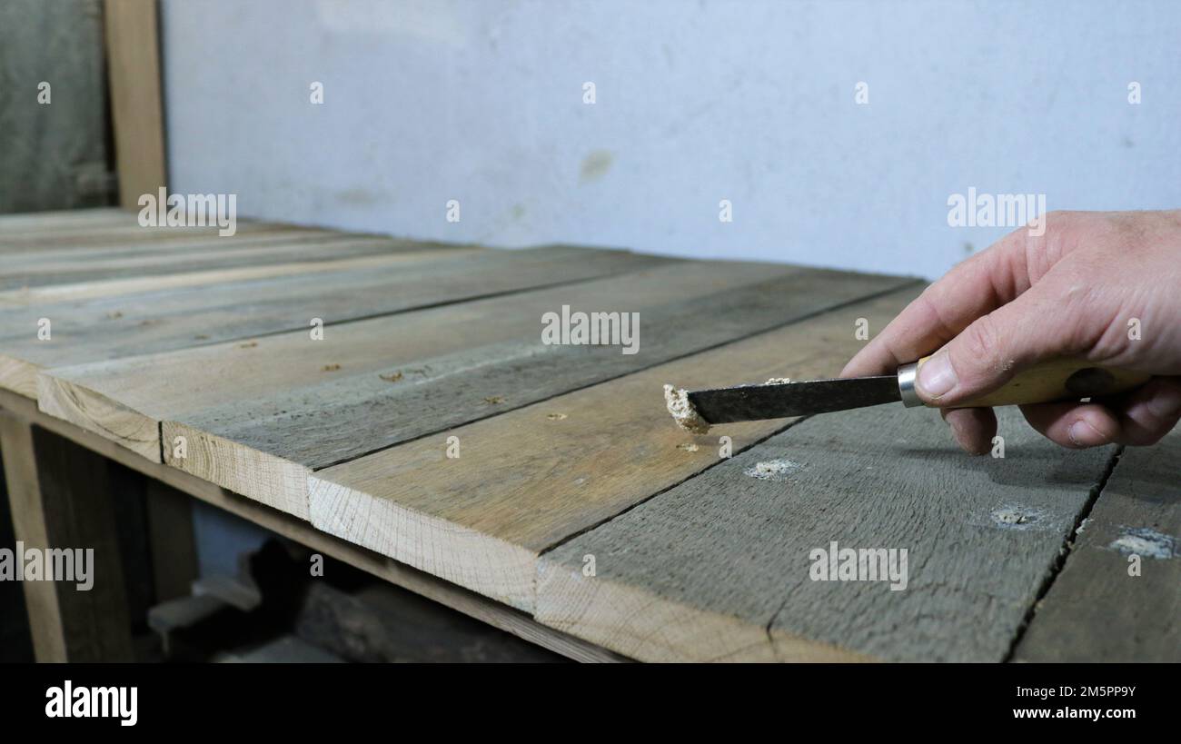 Builder filling holes on house hi-res stock photography and images - Alamy