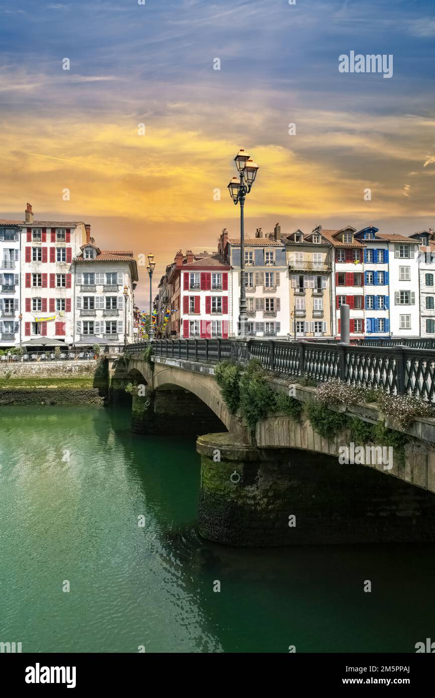 Bayonne in the pays Basque, typical facades and bridge on the river ...