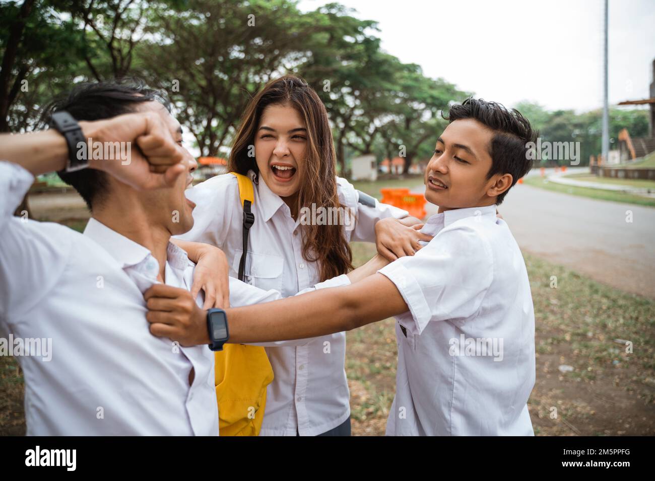 Students bullying at school at uniform hi-res stock photography and ...