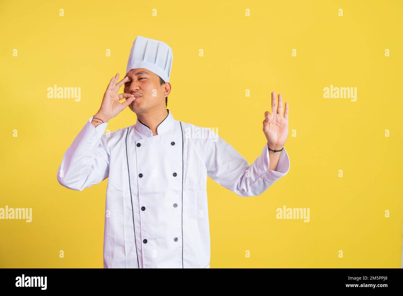 male chef with okay hand gesture while tasting delicious food Stock ...