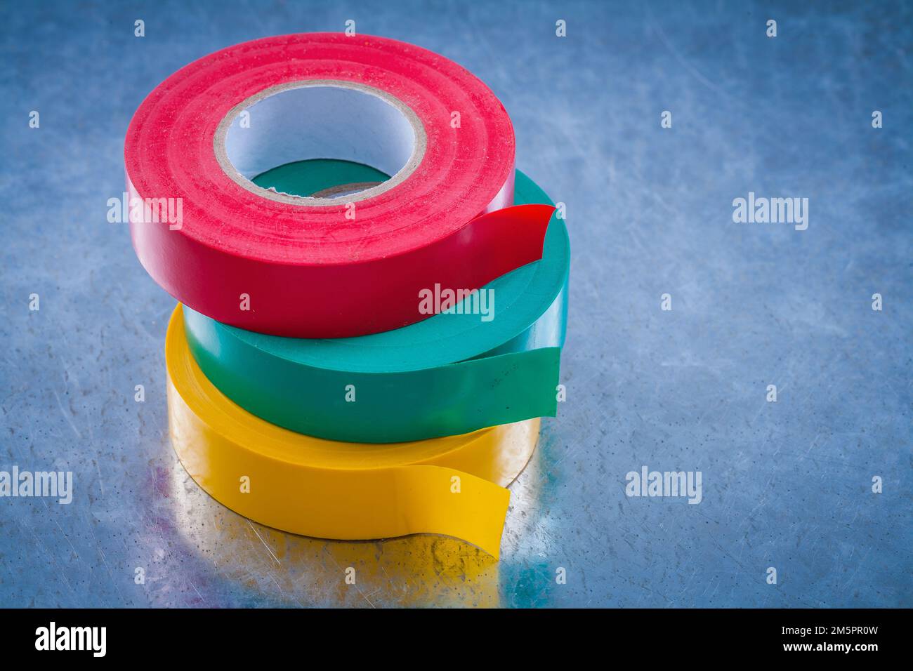 Insulating tapes on scratched metallic background construction concept ...