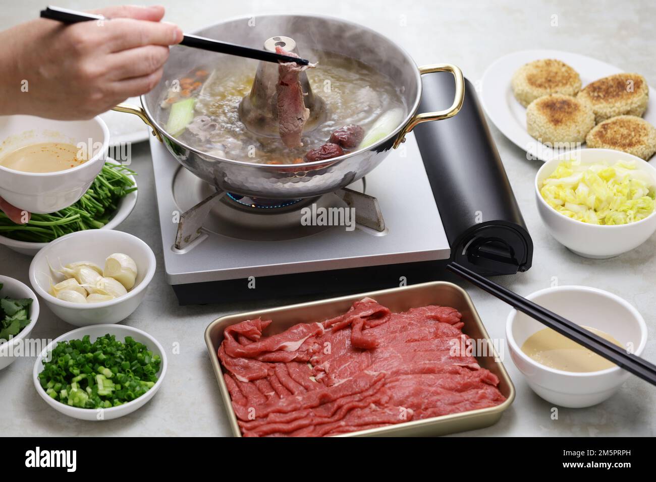 Beijing Shuan yang rou, Chinese hot pot lamb shabu shabu Stock Photo ...