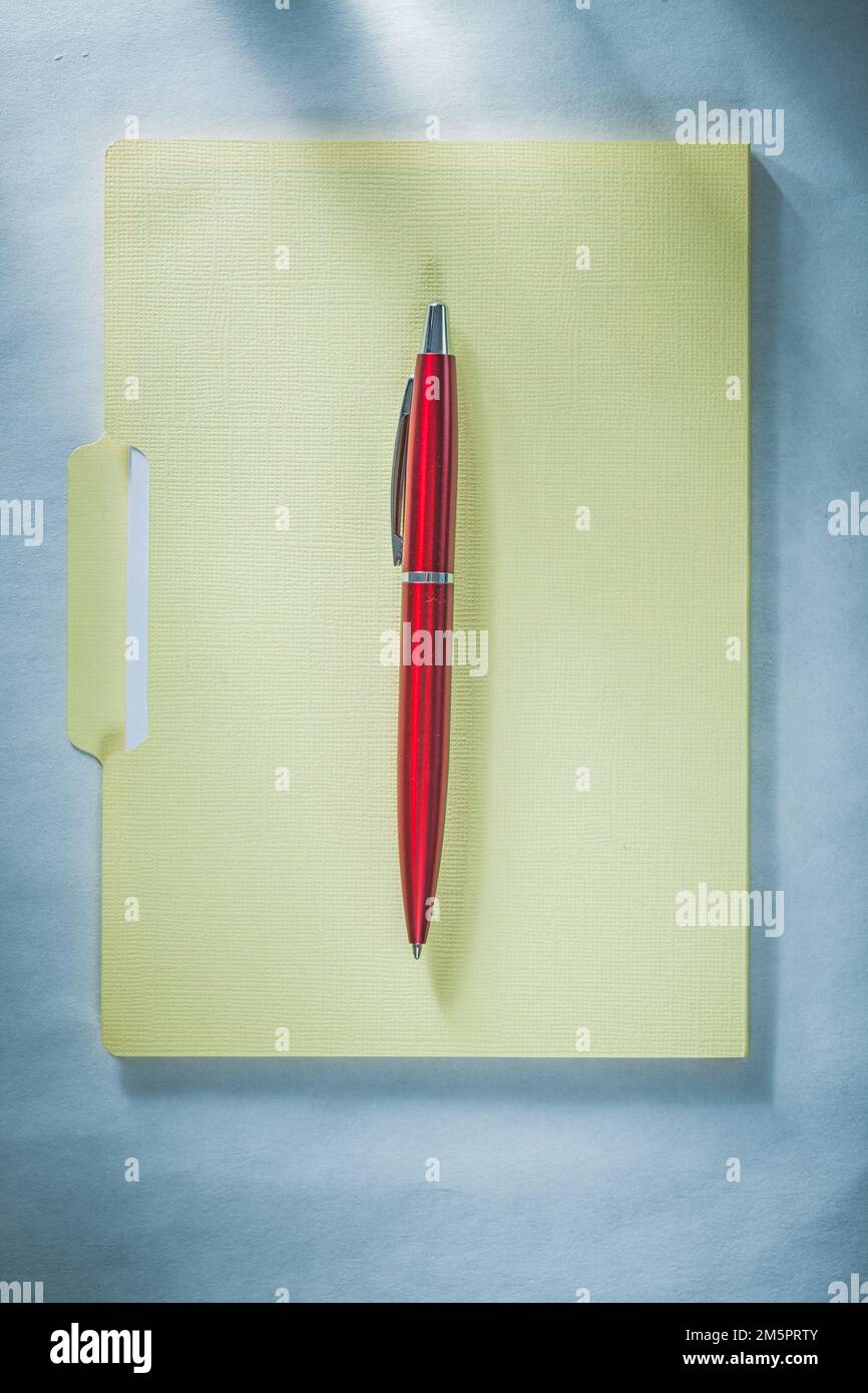 Office paper folder biro pen on white background Stock Photo - Alamy