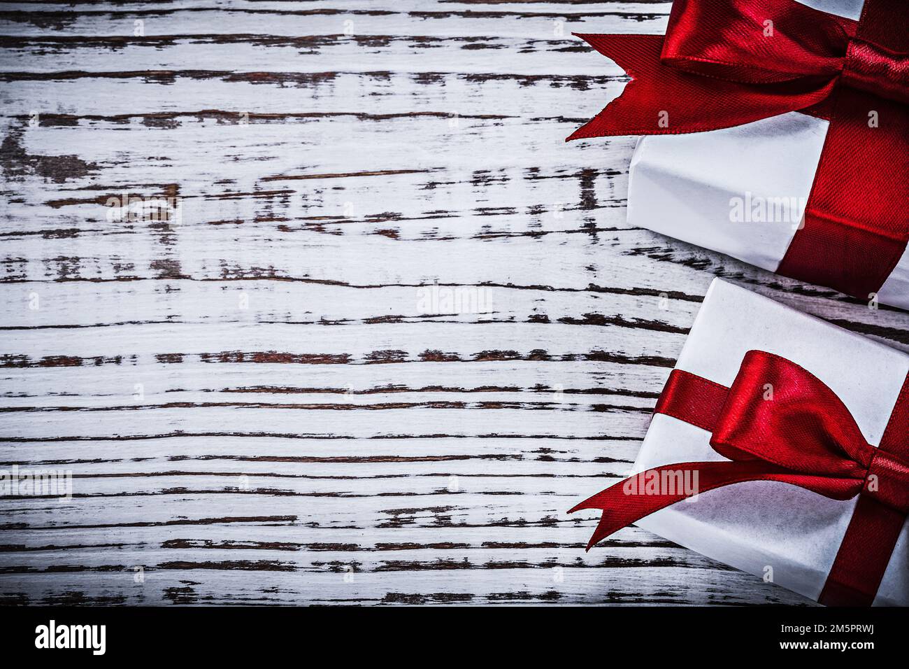 Packed gift box on vintage wooden board holidays concept Stock Photo ...