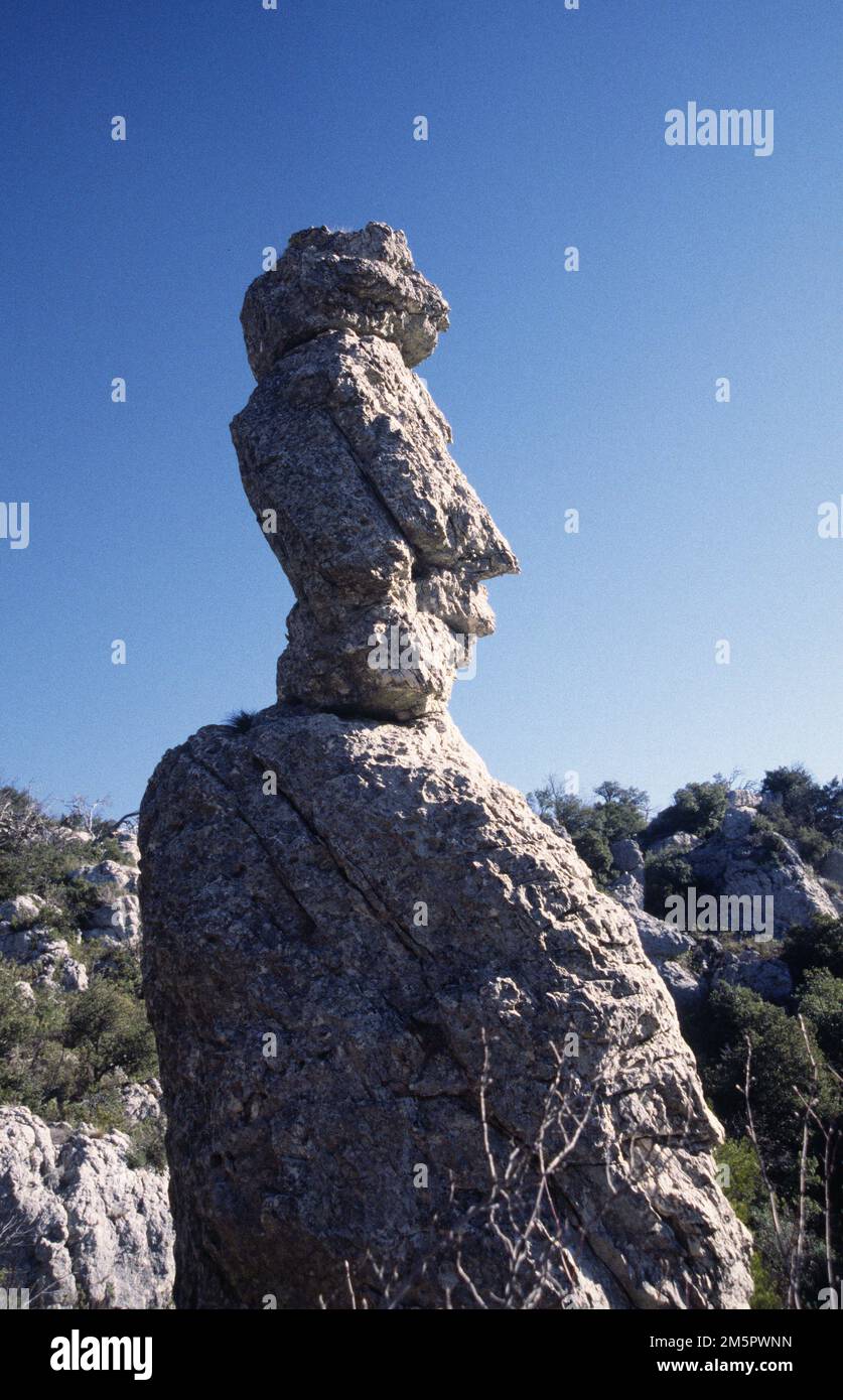 Limestone rock carved out by erosion into human figure at La Loube ...