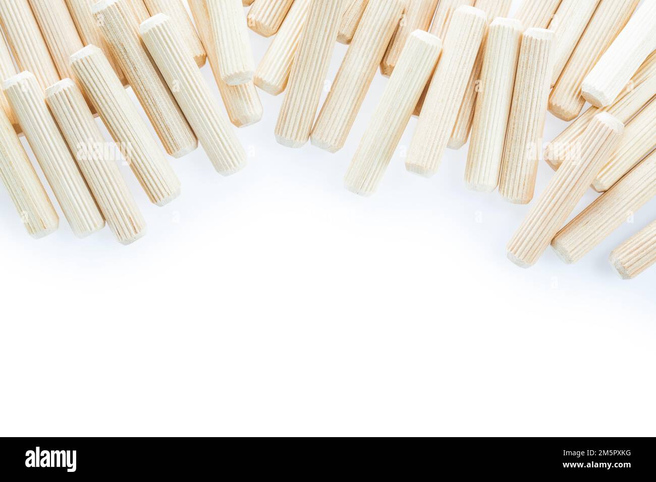 Stack of construction wooden dowels isolated on white Stock Photo - Alamy
