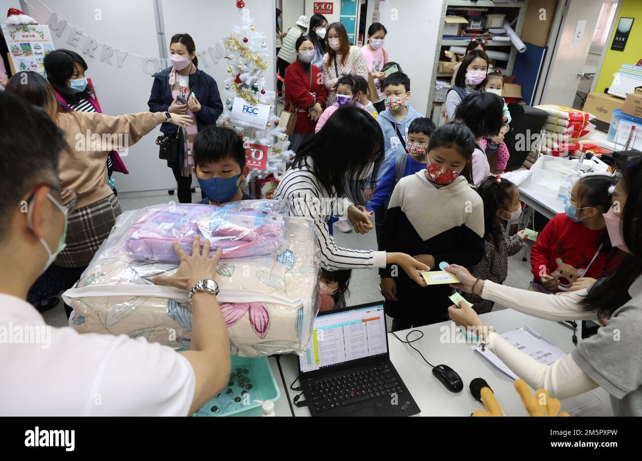 Society for Community Organization (SoCo) handing out Christmas gifts ...