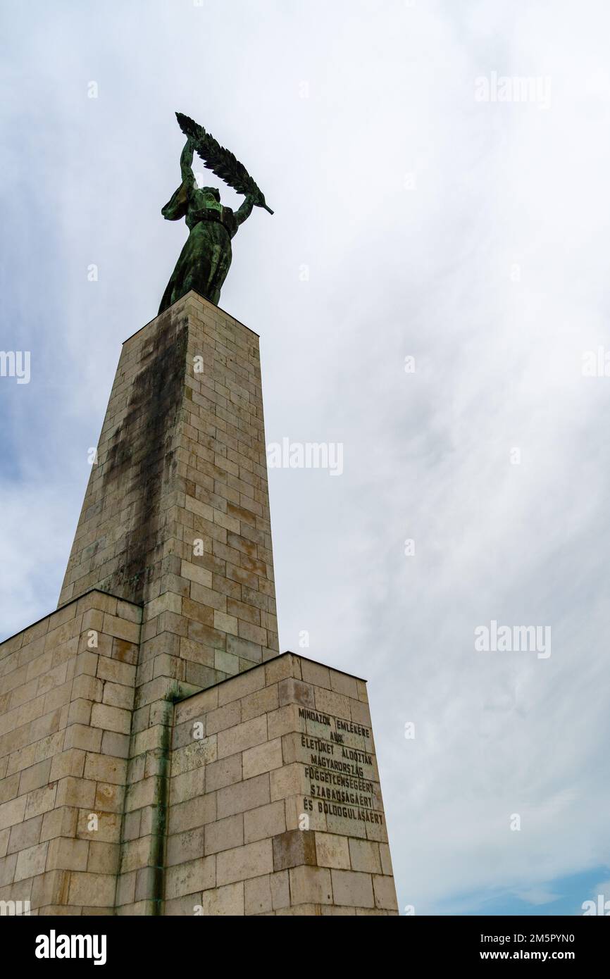 The historic Liberty Statue upon Gellert Hill in front of a cloudy sky ...