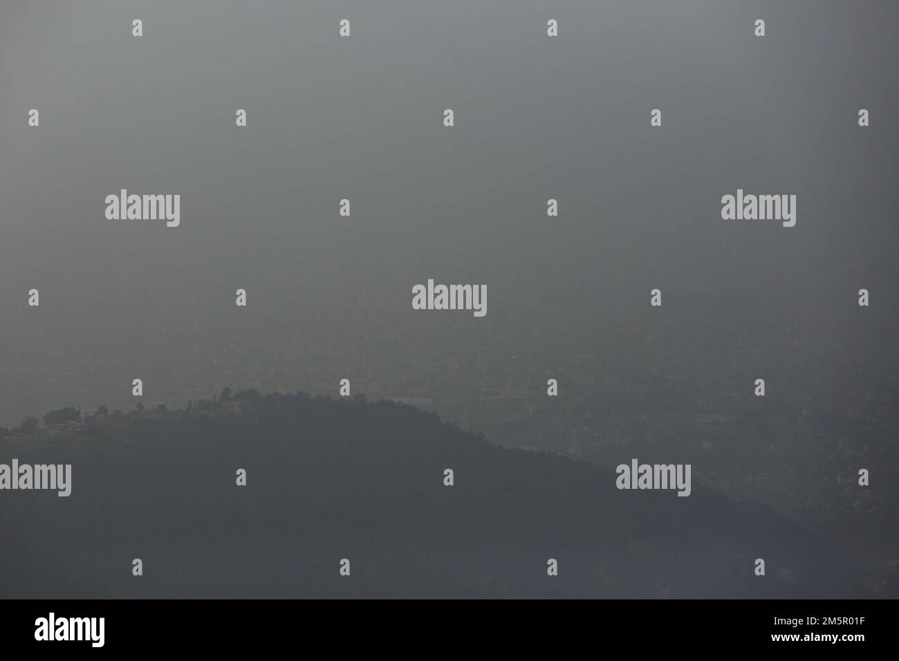 Nepal. 30th Dec, 2022. Smog and air pollution in Kathmandu Valley as seen from Ranikot ...
