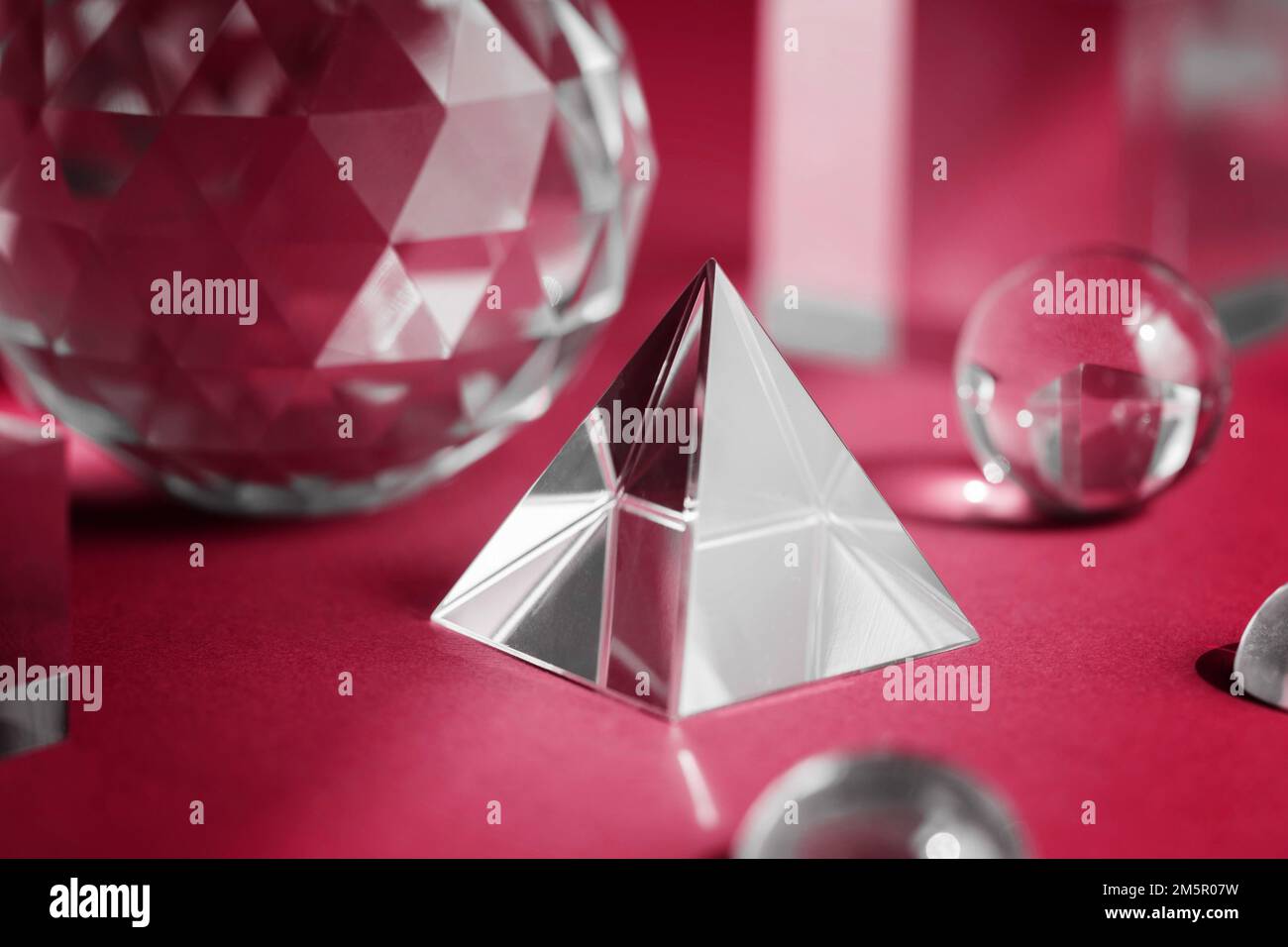 Color of the year 2023 Viva magenta. Crystal prism refracting light ...