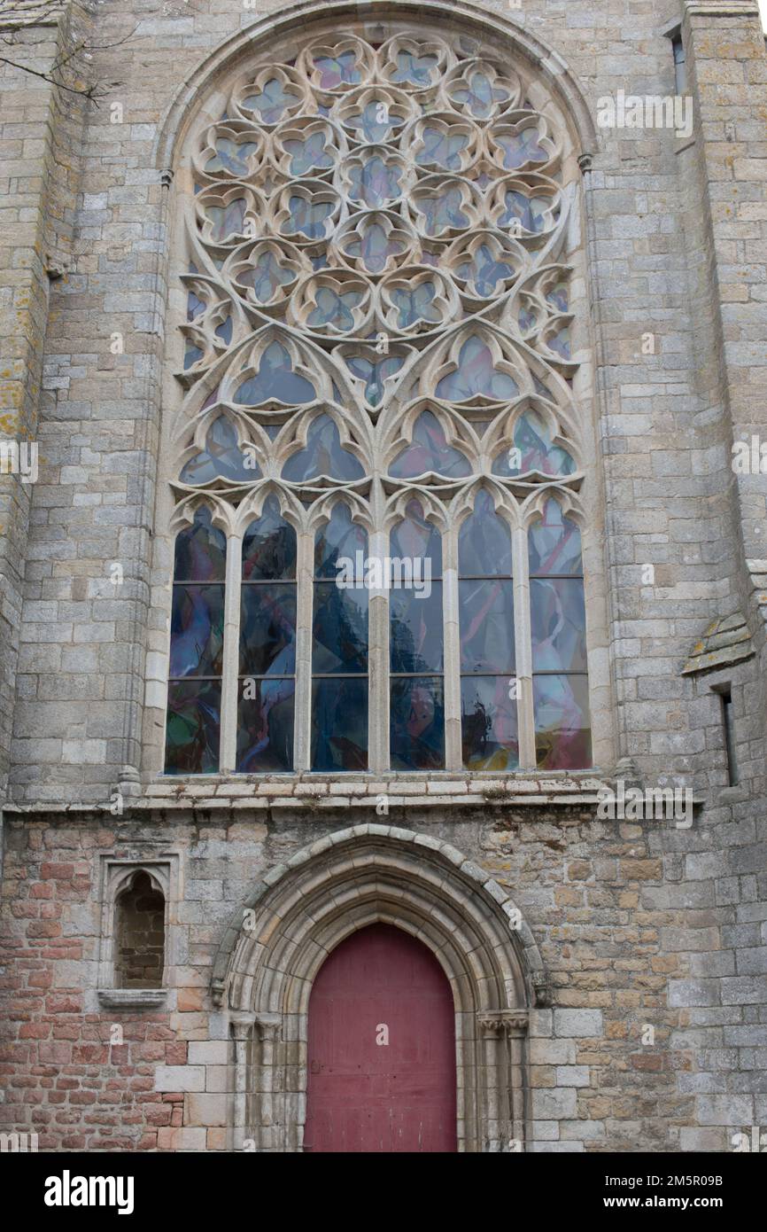 A vertical closeup of the window of a gothic cathedral in Saint Pol de ...