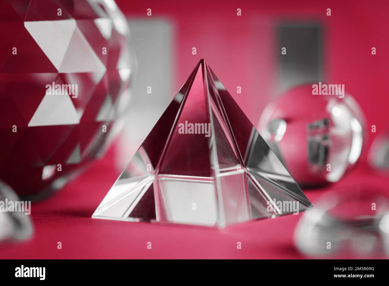 Color of the year 2023 Viva magenta. Crystal prism refracting light ...