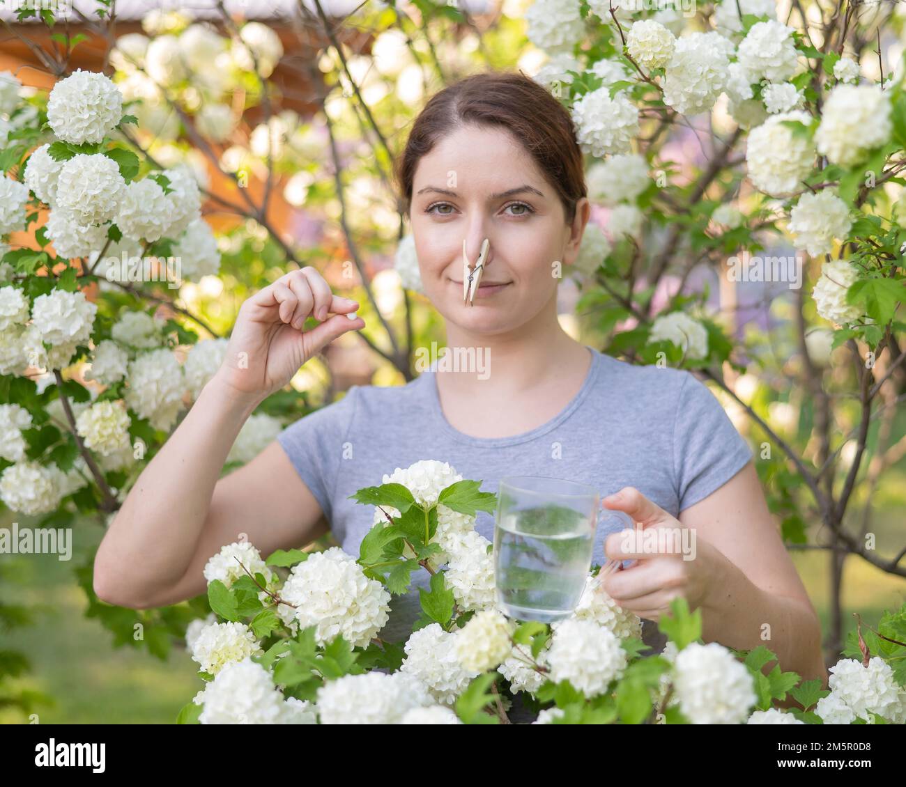 Caucasian woman takes an antihistamine medicine and removes a ...