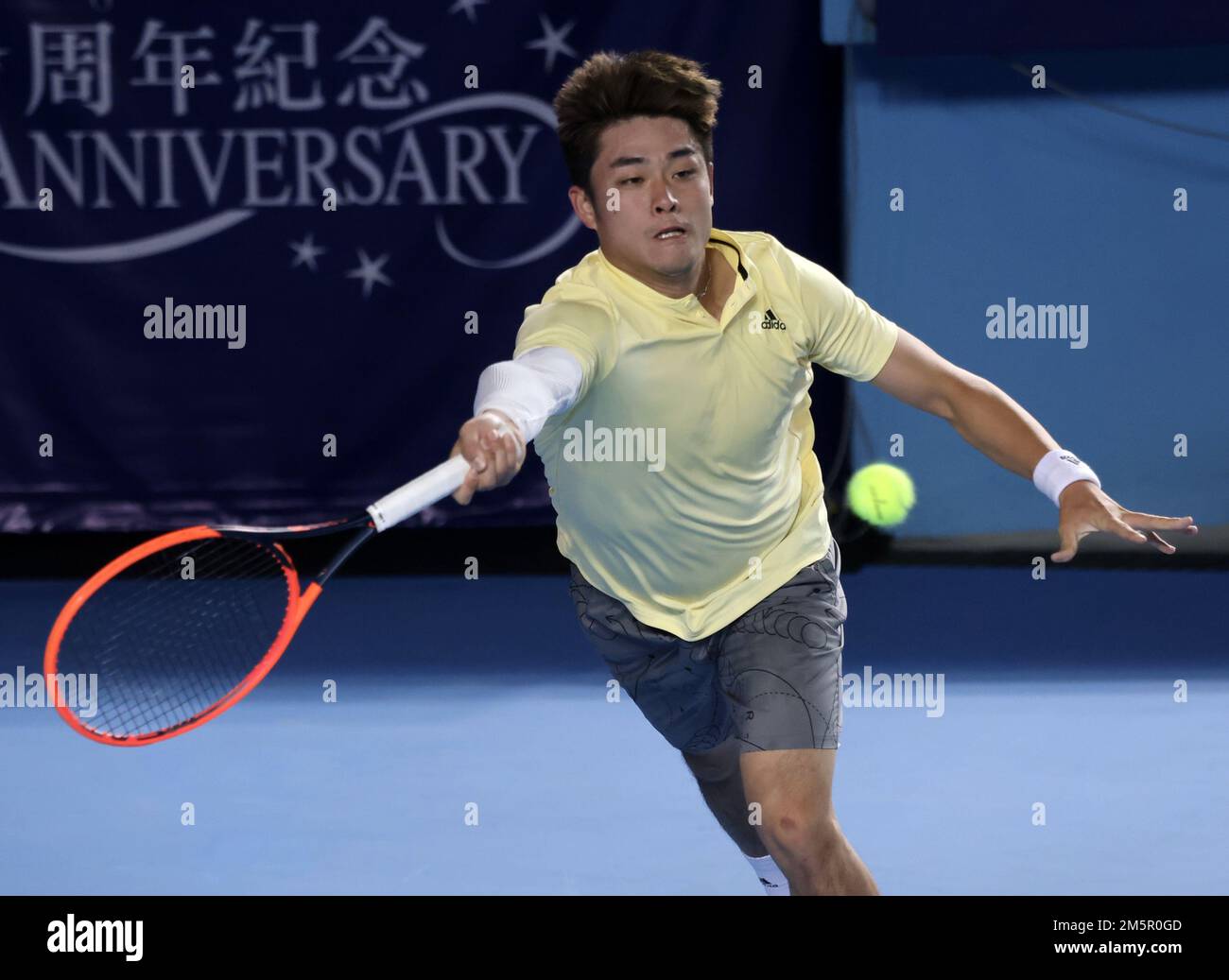 Wu Yibing in action against Stan Wawrinka, at the Hong Kong ...