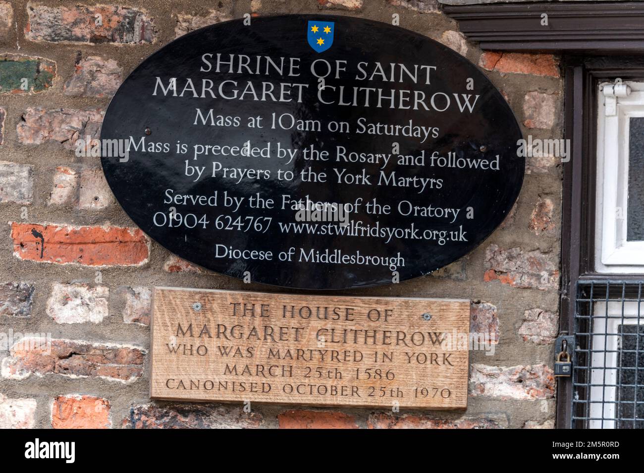 A wall plaque on the home and Shrine wall of Saint Margaret Clitherow ...