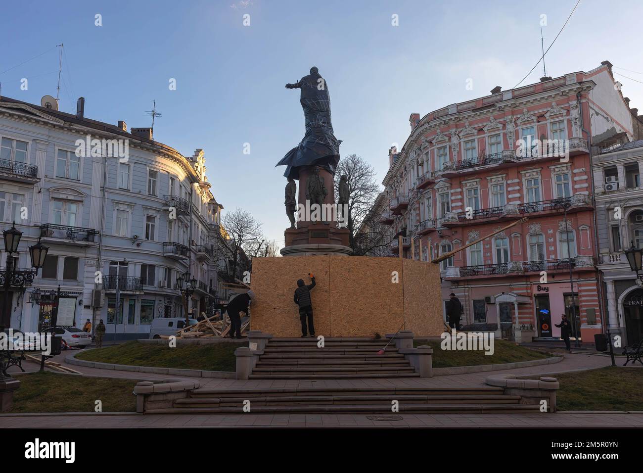 Workers are dismantling protective plywood fences around the monument ...