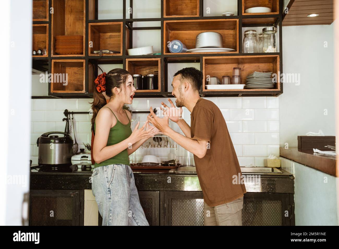 young asian women and men arguing while fighting Stock Photo - Alamy