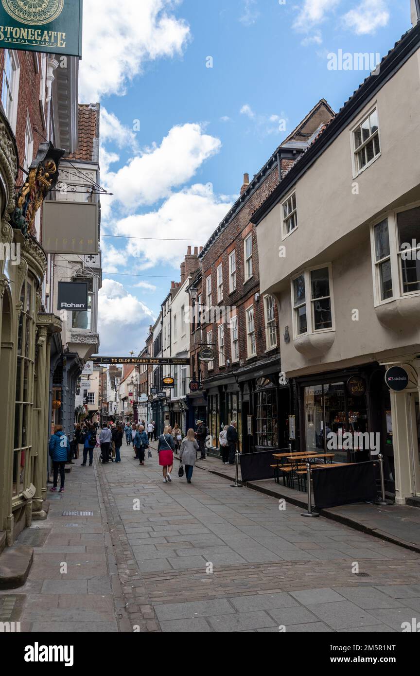 Stonegate street in the medieval quarter of York in Yorkshire, Britain ...