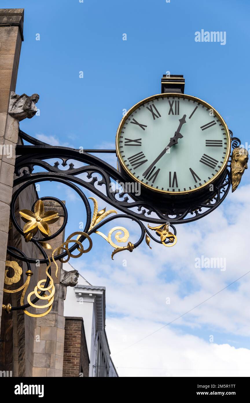 The massive street clock hanging on the grade 11 listed medieval St ...