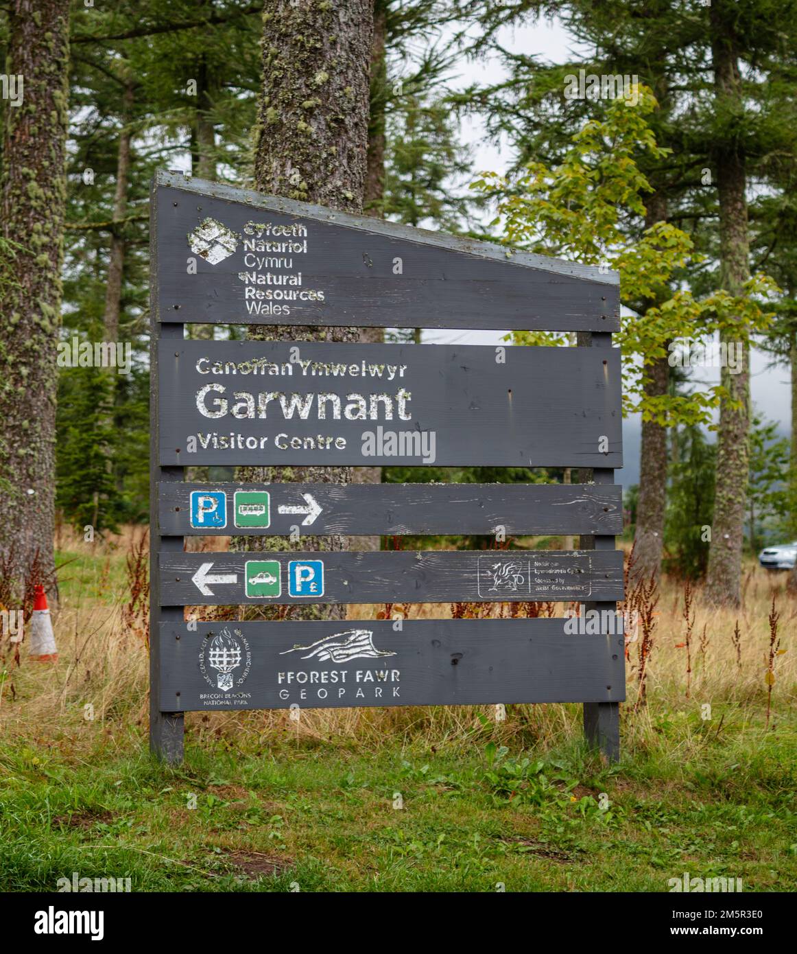 A vertical shot of a visitor center sign at Garwnant in the Brecon ...