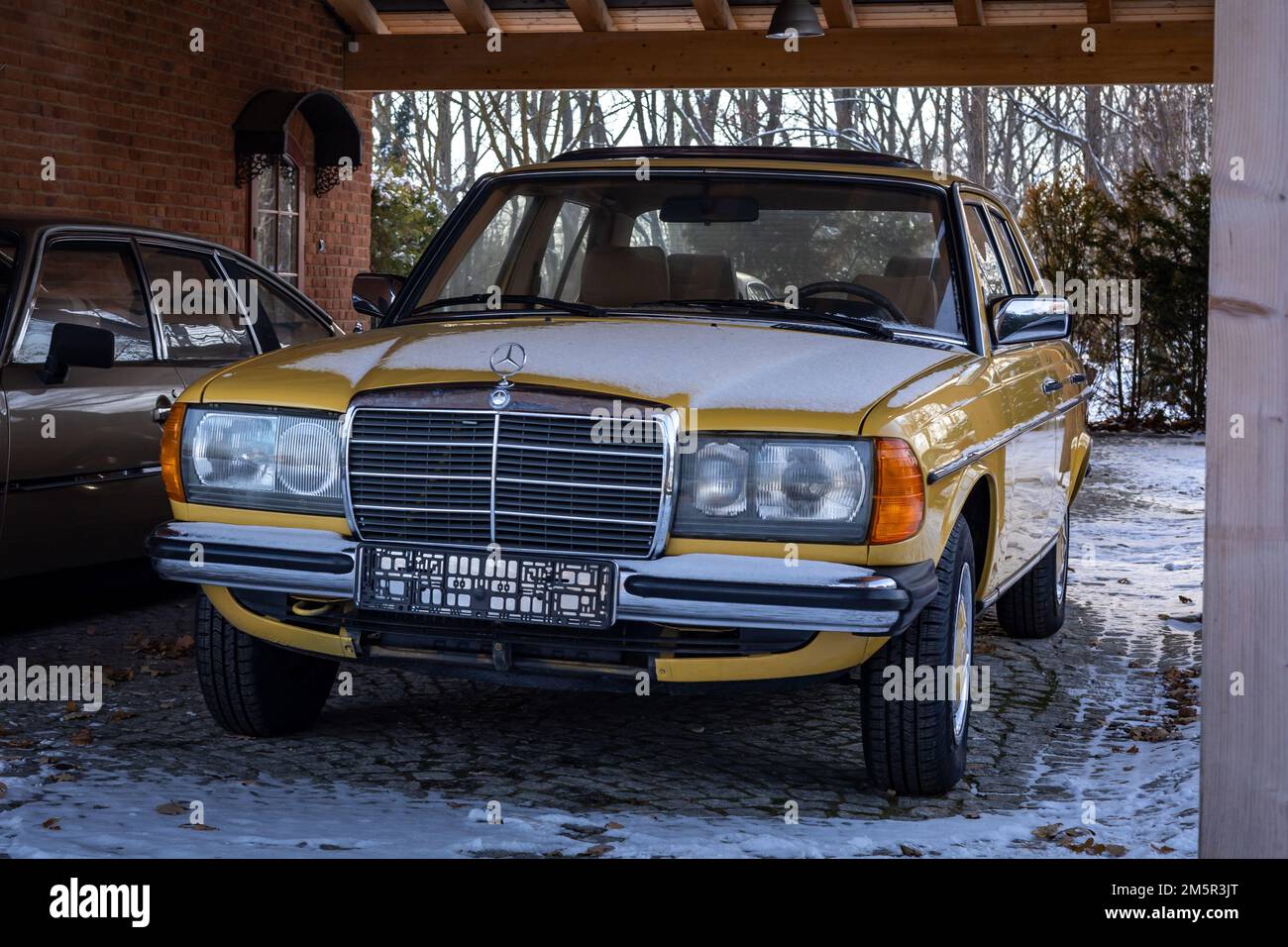 Topacz Castle, Poland - December 20, 2022: Classic yellow Mercedes Benz ...