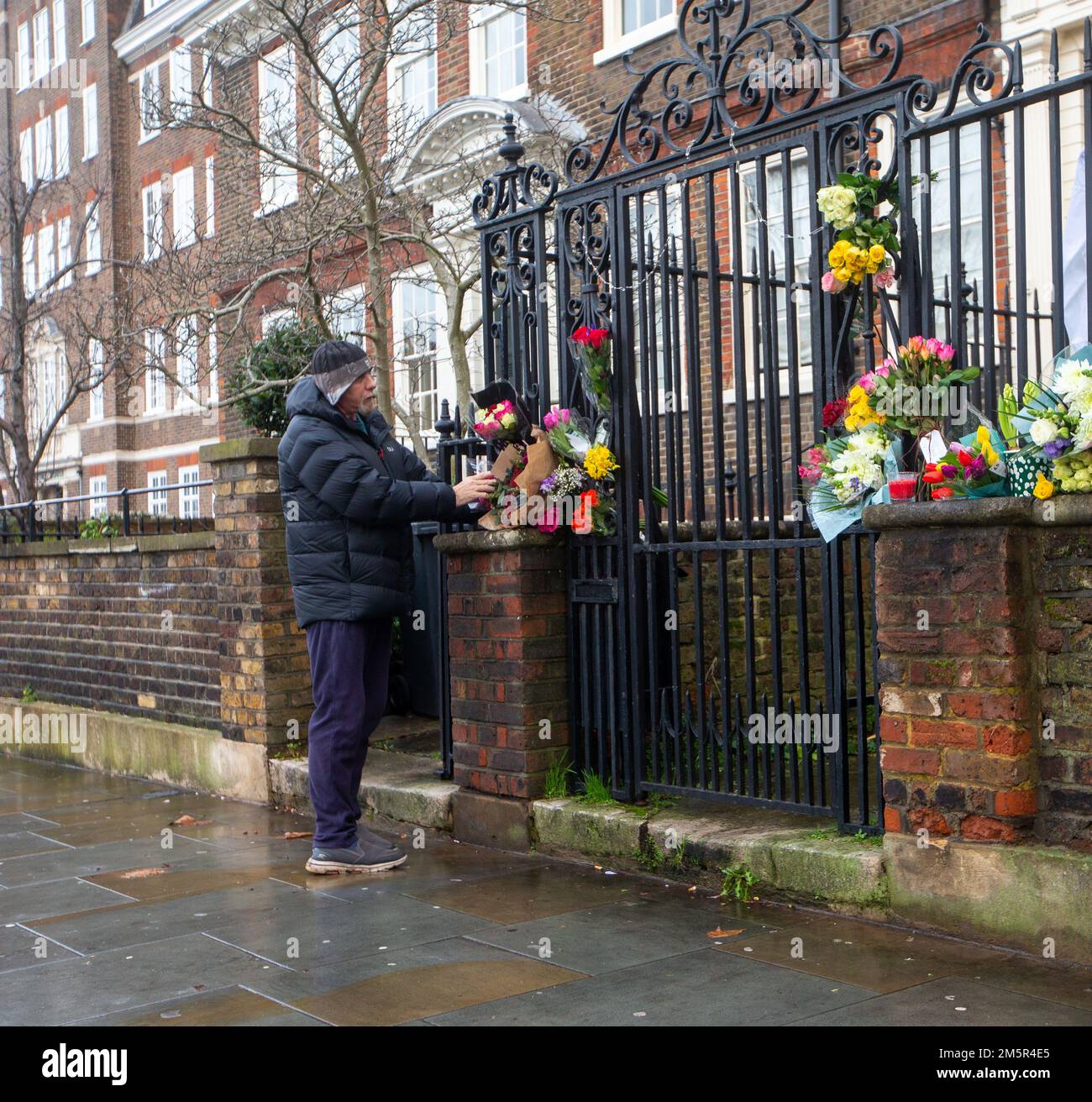 London, England, UK. 30th Dec, 2022. Floral tributes are seen outside ...
