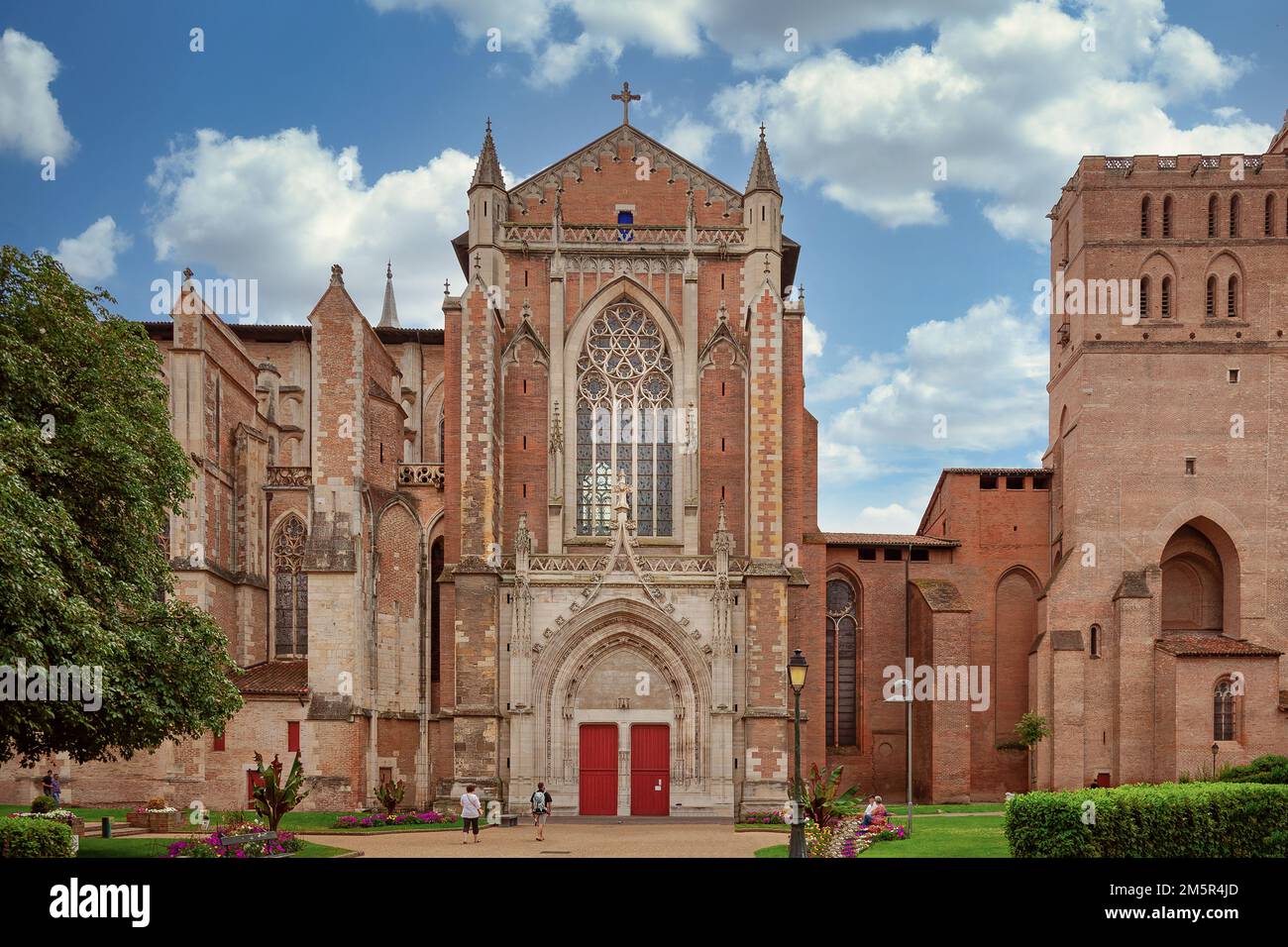 Gothic facade of Saint-Etienne Cathedral with rose window, pinnacles ...
