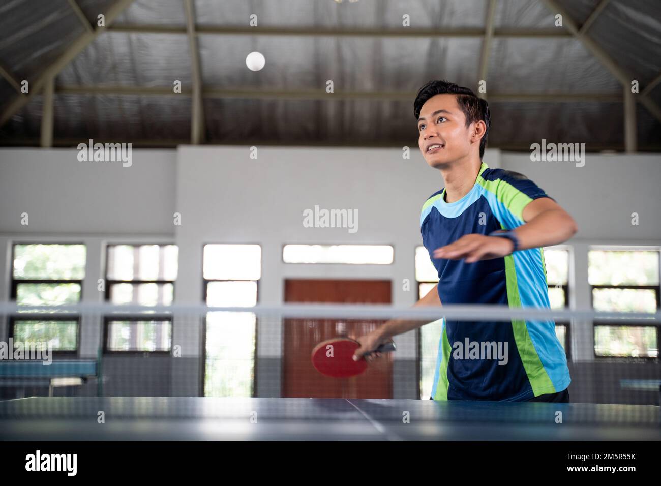 Dropped balls will be received by the male players Stock Photo - Alamy