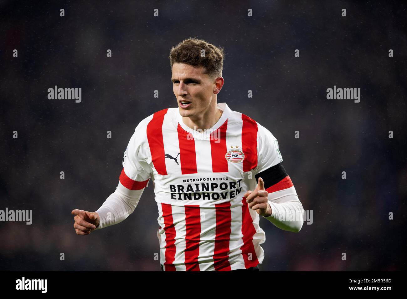 EINDHOVEN Guus Til of PSV scores the 1-0 for PSV against AC Milan ...