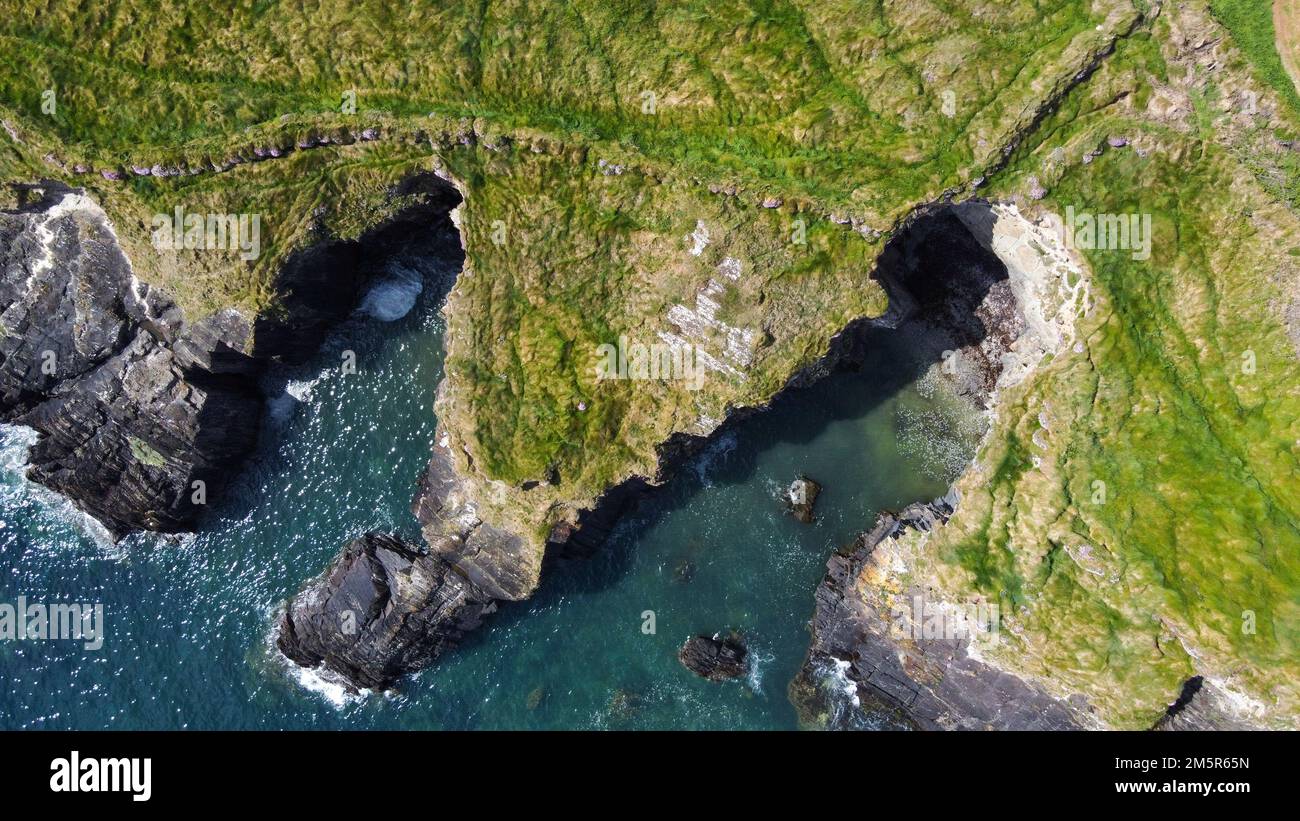 Grassy cliffs on the Atlantic Ocean coast. Landscape of Ireland from a ...