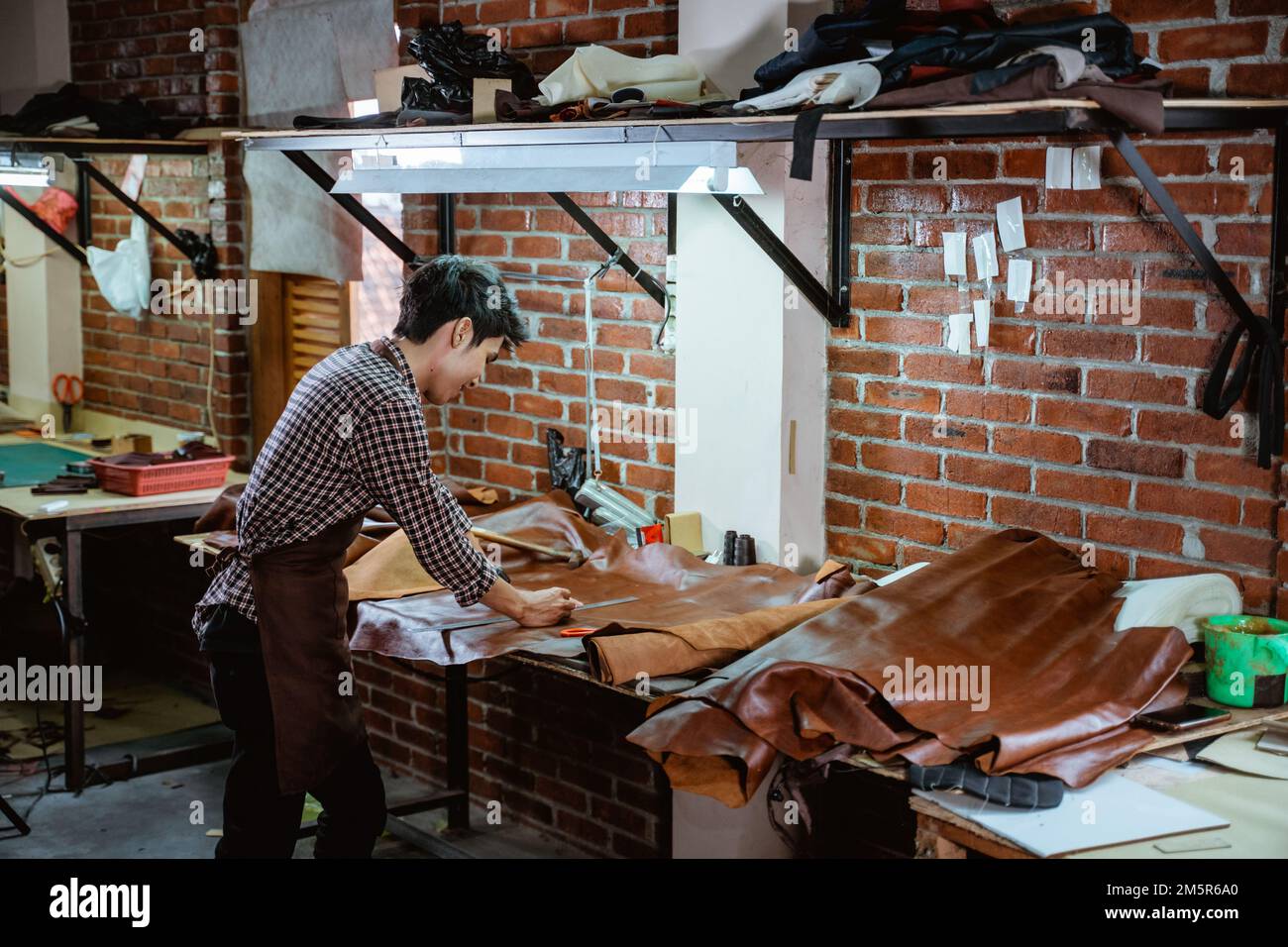Traditional leather making process handmade hi-res stock photography ...