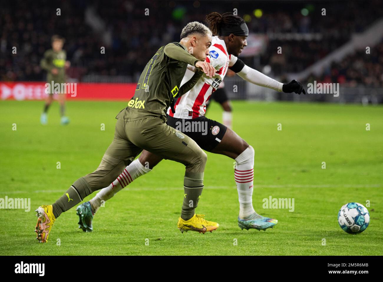 EINDHOVEN Sergino Dest Of AC Milan, Noni Madueke Of PSV against AC ...