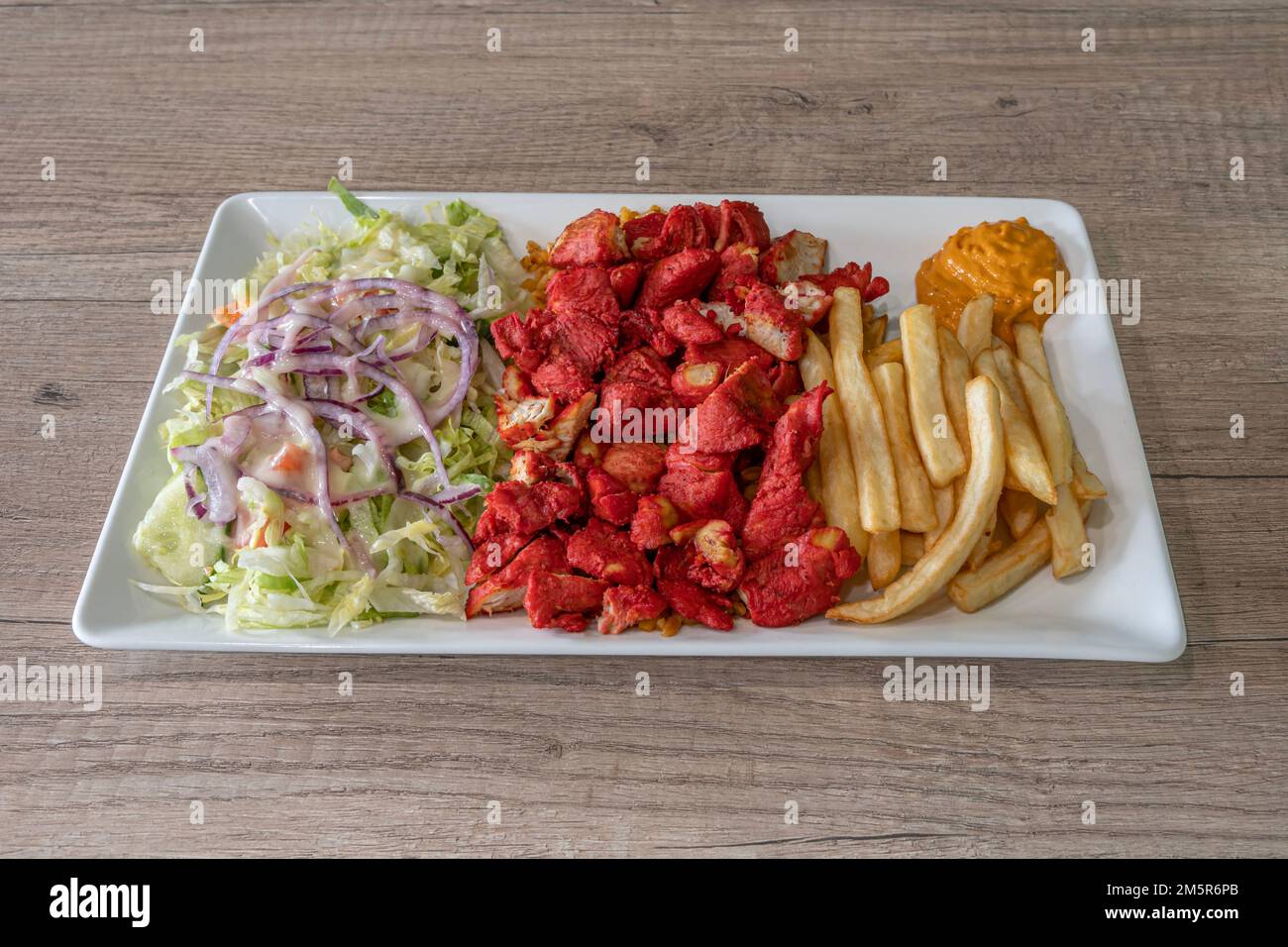 Middle East dishe culinary Still Life. Tandoori chicken platter with ...