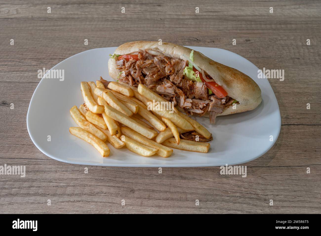 Middle East dishe culinary Still Life. Sandwich Kebab with french fries ...