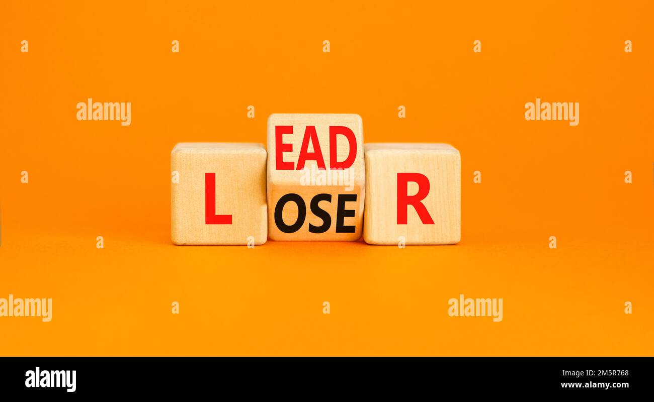 Leader or loser symbol. Concept word Leader Loser on wooden cubes ...