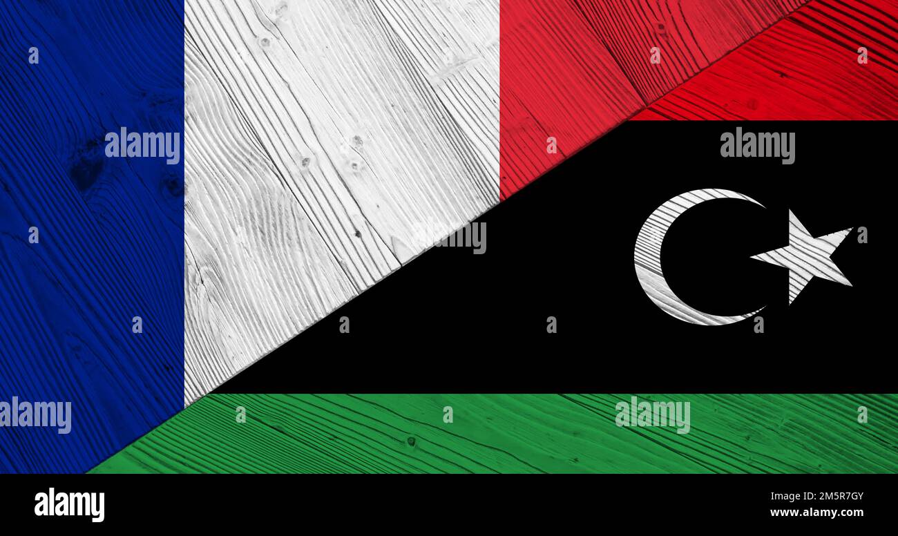 Background with flag of France and Libya on wooden split board. 3d ...